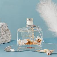 China Unique Bottles Gift Box Cover Container Ocean Scented Oil Glass Reed Diffuser for sale