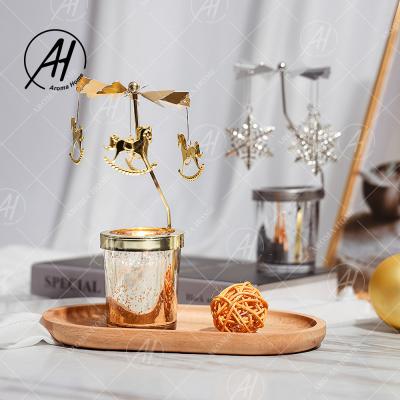 China Bulk Glass Jar Scent Candle Rotating Trotting Horse Lamp Aroma Home Candle for sale
