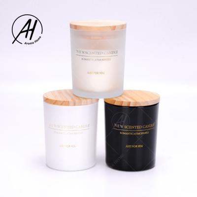 China Perfumed Big Essential Oil Black White Matte Glass Jar 100% Soy Wax Spa Candle for sale