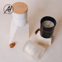 China Perfumed Big Essential Oil Black White Matte Glass Jar 100% Soy Wax Spa Candle for sale