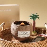 China Natural Bedroom Fragrance Soy Wax Coconut Shell Bowl Shape Scented Candle for sale