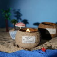 China Natural Bedroom Fragrance Soy Wax Coconut Shell Bowl Shape Scented Candle for sale