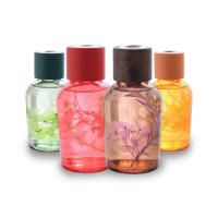 China Meditation Peony Flower Reed Diffuser Oil With Wooden Lid for sale