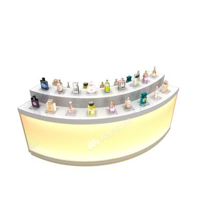 China Perfume Makeup Skincare Display Rack Display Showcase Curved Counter With Light for sale
