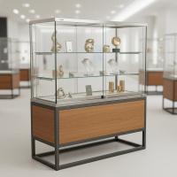 China Tempered Glass and Stainless Steel Store Display Showcase with 50kg Per Shelf Capacity and LED Strip Lighting for Cosmetic Display Cabinet for sale