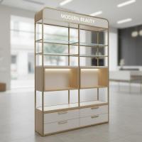 China Modern Adjustable Height Store Display Showcase with Tempered Glass and Stainless Steel Frame for Stylish Cosmetic Display Shelf for sale