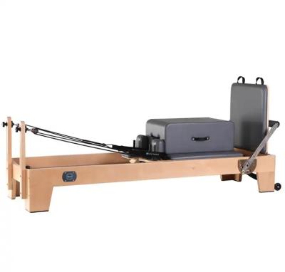 China Maple Wooden Pilates Reformers With Wheels Portable Pilates Equipment Suitable For Studios And Clinics for sale