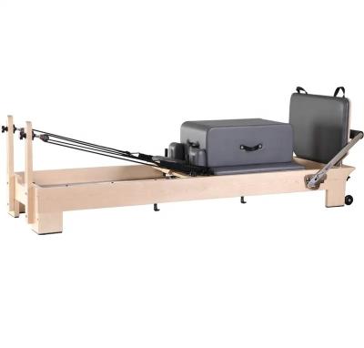 China Wood Pilates Reformer Equipment 85 X 24 X 14 Inches Frame Material Engineered for Pilates Studios and Wellness Centers for sale