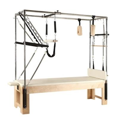 China Adjustable Springs Cadillac Reformer Pilates Equipment Suitable for Beginner To Advanced Pilates Practitioners Enhancing Flexibility Strength and Balance for sale