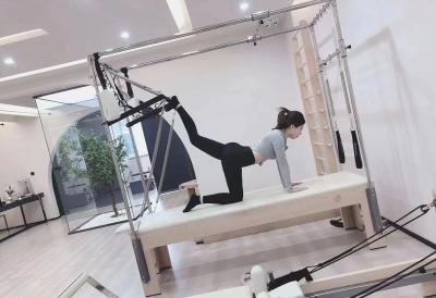 China Suitable for Beginner to Advanced Pilates Practitioners Cadillac Pilates Reformer Natural Wood Finish Not Designed for Frequent Moving Pilates Training Equipment for sale