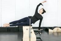 China Adjustable Springs Resistance System Pilates Chairs Featuring Wood Frame and Typically 2 to 4 Springs Suitable for Fitness Centers for sale