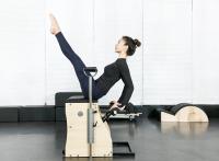 China Adjustable Springs Resistance System Pilates Chairs Featuring Wood Frame and Typically 2 to 4 Springs Suitable for Fitness Centers for sale