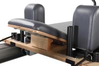 China Aluminum Pilates Reformer with tower featuring steel frame padded upholstery ideal for studio and gym for sale