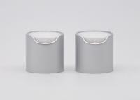 China 24mm Aluminum Disc Top Cap Matte Silver Plastic Screw For Bottles UV Coating for sale