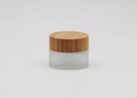 China Cylinder Glass Cosmetic Cream Jar Container With Bamboo Screw Cap 50ml for sale
