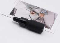 China Frosted Black Essential Oil Bottles 50ml Cylinder Package Screen Printing for sale