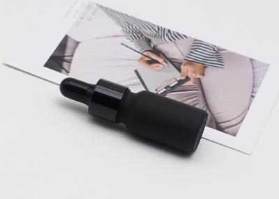 China Frosted Black Essential Oil Bottles 50ml Cylinder Package Screen Printing for sale