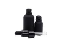 China Frosted Black Essential Oil Bottles 50ml Cylinder Package Screen Printing for sale