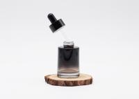 China Luxury Black Essential Oil Bottle Dropper Serum Glass Cylinder Cosmetic for sale