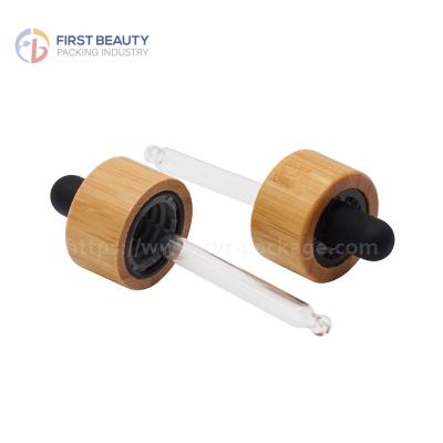 China Essential Oil Glass Dropper With Engraved Logo And Natural Bamboo Color Closure for sale