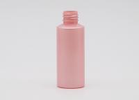 China Flat Shoulder Pink PET 50ml Small Plastic Spray Bottles Refillable With Yellow Pump for sale