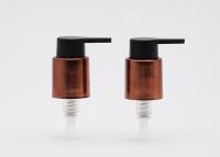 China Bronze Glossy Closure 24mm Cosmetic Treatment Pumps With Matte PP Pump Head for sale
