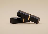 China Cuboid Black Lip Balm Tubes Screen Printing Surface Gold Aluminum Ring In Middle for sale