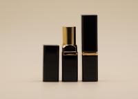 China Cuboid Black Lip Balm Tubes Screen Printing Surface Gold Aluminum Ring In Middle for sale