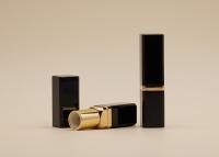 China Cuboid Black Lip Balm Tubes Screen Printing Surface Gold Aluminum Ring In Middle for sale
