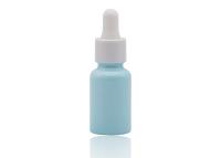 China Bluish Color Coating Essential Oil Dropper Bottles White Ceramic Bottle 30ml for sale