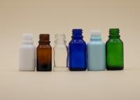 China Amber Empty Essential Oil Bottles Color Coating White Ceramic Dropper Bottle for sale
