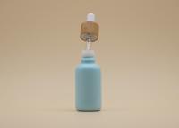 China Free Samples Blue Color Essential Oil Glass Bottles With Bamboo Dropper for sale