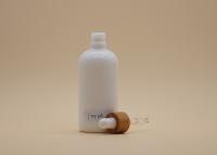 China Cylinder Shape White Glass Dropper Bottles 100ml For Cosmetic Packaging for sale