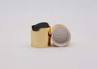 China Cosmetic Aluminum Shiny Gold Disc Top Cap Black Or White PP Disk Cap 24mm for sale