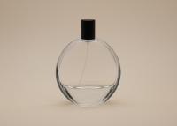 China Anti Spilling Glass Round Perfume Bottle 100ml Customized Surface Handing for sale