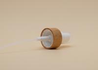 China 24mm White Mist Sprayer Pump Bamboo Sheathed Half Cap For Personal Care for sale