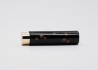 China Black Round Lip Balm Containers Magnet Press Button Tube With Printing for sale