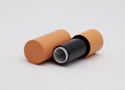 China Orange Rubber Soft Touch Empty Lip Balm Tubes BulkRound Frosted for sale