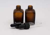China Latex Rubber 30Ml Dropper Glass Amber Glass Essential Oil Bottle for sale