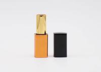 China 3.5g Square Fancy Orange Lip Balm Container Tube Bulk for sale