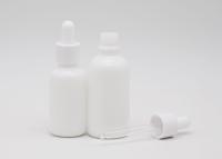 China 30ml Cylinder Cosmetic Oil Glass Bottle With Various Droppers for sale