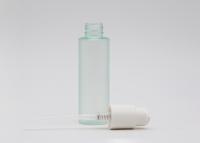 China 100ml Glass Cosmetic Pump Bottle Flat Shoulder Clear Green Color for sale