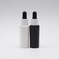 China Black And White Cosmetic Plastic Dropper Bottle 30ml Empty Essential Oil Bottle for sale