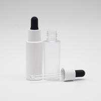 China Black And White Cosmetic Plastic Dropper Bottle 30ml Empty Essential Oil Bottle for sale