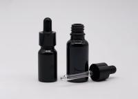 China Black Cylinder Glass Dropper Bottles Vial 30Ml With Dropper Customers Logo for sale