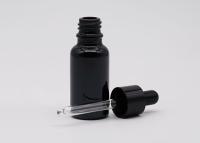 China Black Cylinder Glass Dropper Bottles Vial 30Ml With Dropper Customers Logo for sale
