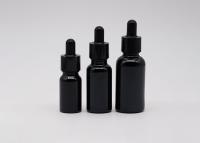 China Black Cylinder Glass Dropper Bottles Vial 30Ml With Dropper Customers Logo for sale