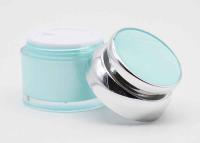 China Light Blue And Shiny Silver Color Cylinder Plastic Jar 50g Skin Care Round for sale