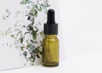 China 10ml 30ml 50ml Clear Light Green Glass Dropper Bottle Cosmetic Essential Oil Bottle Package for sale
