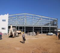 China Prefabricated Steel Workshop Building with C-Section Purlin and Sliding Door for Industrial Use for sale
